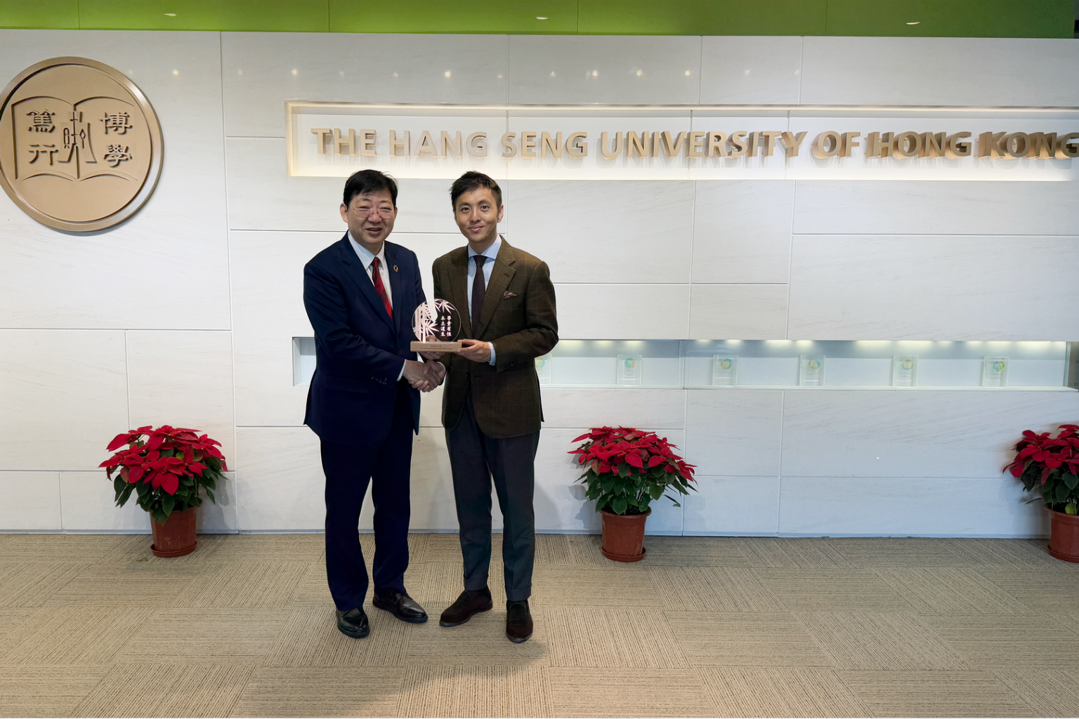 Visit from Mr Solomon Yung and his team members - The Hang Seng ...